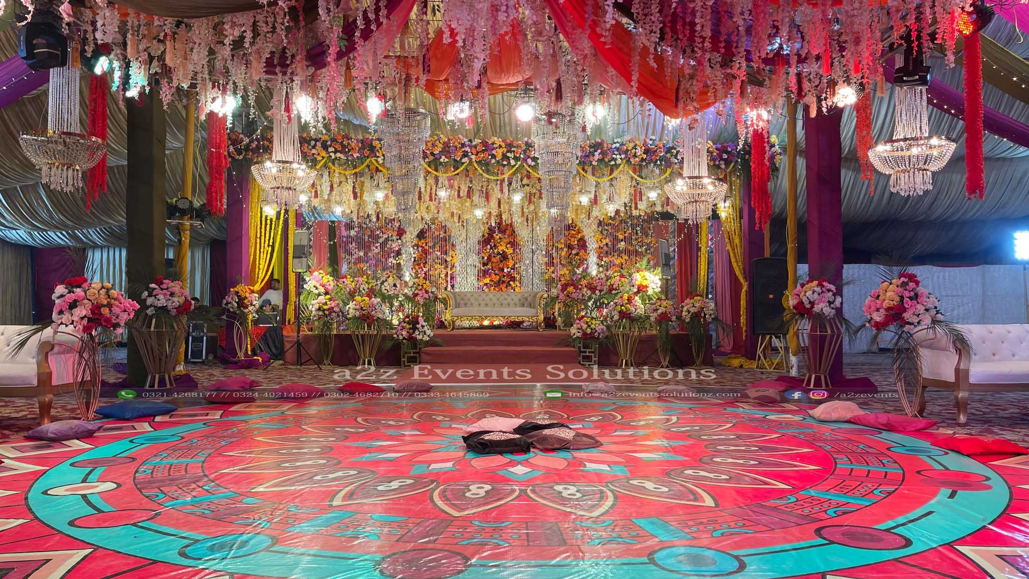 Multicolored Traditional Mehndi | Indoor Wedding Setup | Floral ...